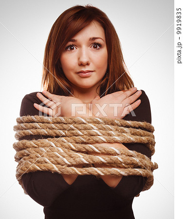 woman prisoner tied rope hostage female bondage...の写真素材 [9919835] - PIXTA