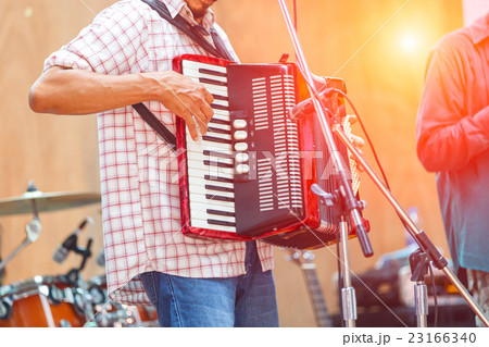 Close up musicians are playing accordion on stageの写真素材 [23166340] - PIXTA