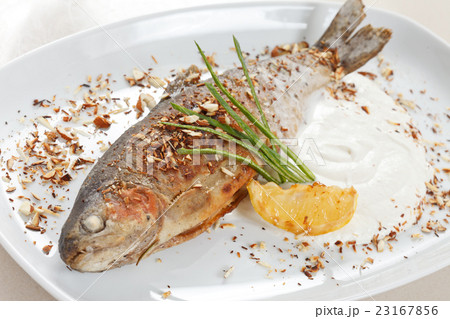 trout fish baked with nutsの写真素材 [23167856] - PIXTA