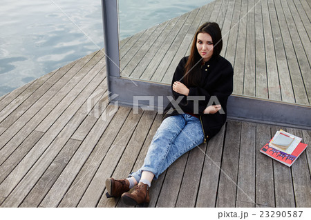 Young female is resting outside の写真素材 [23290587] - PIXTA