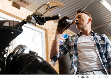 Industrious skillful man relaxing in his workshopの写真素材 [30252809] - PIXTA