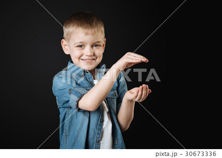 Amusing man child keeping his hands in the airの写真素材 [30673336] - PIXTA