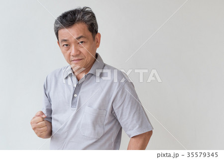 angry upset unhappy unfriendly middle age old manの写真素材 [35579345] - PIXTA