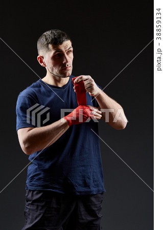 Low key studio portrait of handsome muscularの写真素材 [38859134] - PIXTA