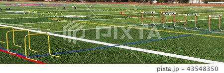 Turf field set up with hurdles and medicine ballsの写真素材 [43548350] - PIXTA