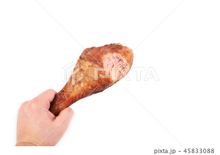 hand holding roasted turkey leg with bite taken...の写真素材 [45833088] - PIXTA