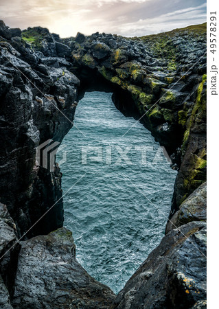 Rock bridge landscape in Arnarstapi, Icelandの写真素材 [49578291] - PIXTA