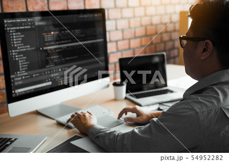 Asian man working code program developer computerの写真素材 [54952282] - PIXTA