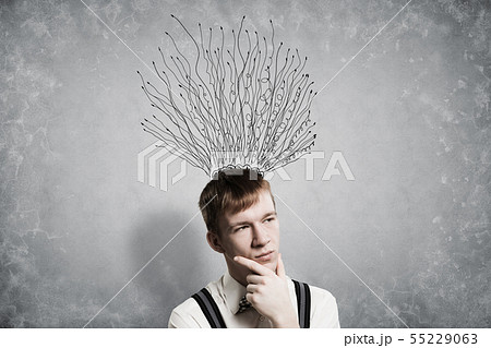 Thoughtful redhead student brainstormingの写真素材 [55229063] - PIXTA