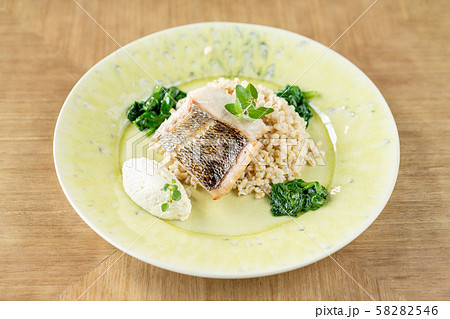 Roasted pike perch or cod fish with bulgur....の写真素材 [58282546] - PIXTA
