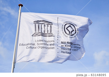 UNESCO white weaving flag, blue skyの写真素材 [63148095] - PIXTA
