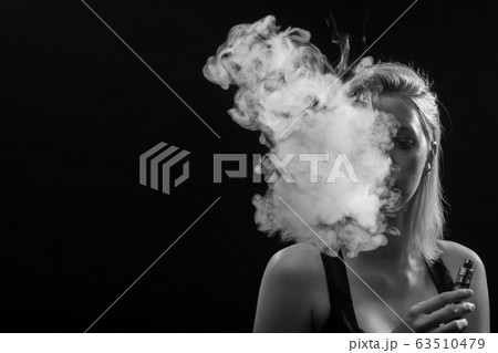 Woman Blowing Smoke Profile
