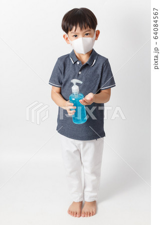 Asian boy wearing a protection maskの写真素材 [64084567] - PIXTA