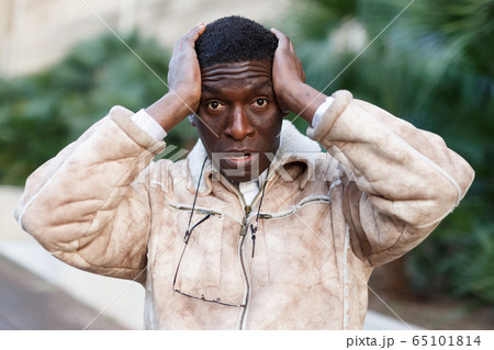 Portrait of bewildered manの写真素材 [65101814] - PIXTA