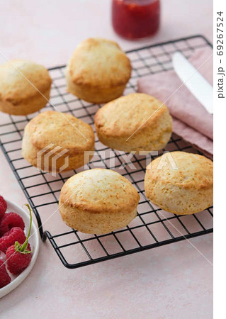 Traditional British Scones with clotted cream, raspberry jam. Scones ...