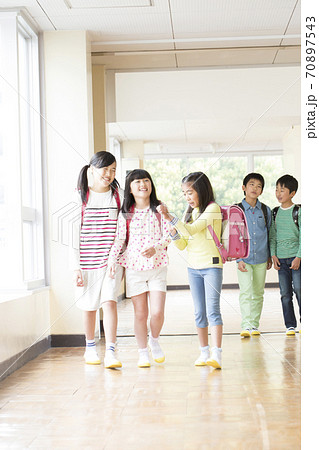 Kids Walking In School Hallway