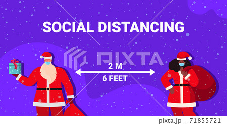 man woman in santa costumes keeping social...のイラスト素材 [71855721] - PIXTA