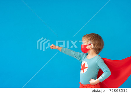 Superhero vs coronavirus COVID-19 pandemic conceptの写真素材 [72368552] - PIXTA