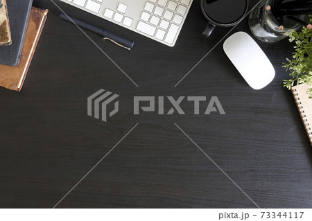 Top view workspace with book and pen coffee...の写真素材 [73344117] - PIXTA