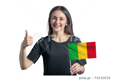 Happy young white woman holding flag of Mali...の写真素材 [74242019] - PIXTA