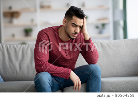 Closeup portrait of stressed arab guy having...の写真素材 [80504559] - PIXTA