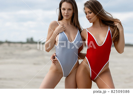 Sexy women in swimsuits on beach 82509386 PIXTA