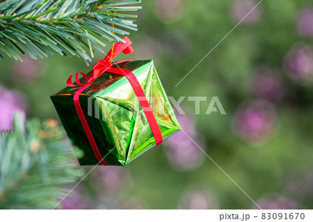 Close up of a wrapped gift box hanging on a...の写真素材 [83091670] - PIXTA