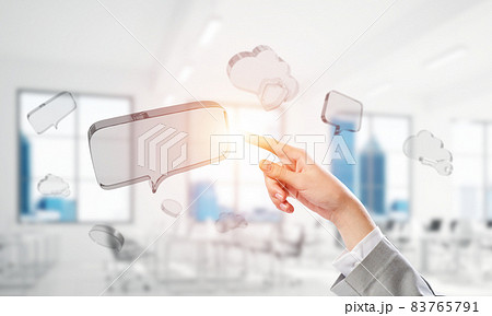 Female hand touching with finger glass icon fly in air. Mixed media ...