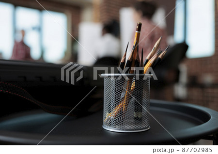 Close up of graphic pencils stand standing on table in creativity ...