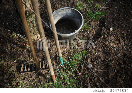 Overhead view of garden tools and a bucket for...の写真素材 [89472354] - PIXTA
