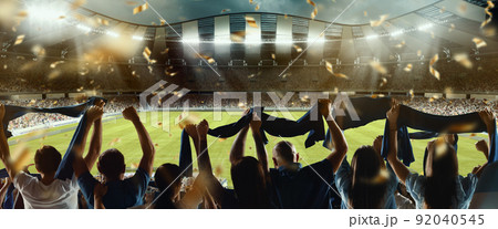 Back view of football, soccer fans cheering...の写真素材 [92040545] - PIXTA
