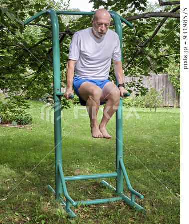 senior male exercising on outdoor fitness towerの写真素材 [93198575] - PIXTA