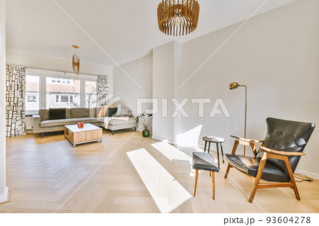 Interior of living room with comfortable sofa...の写真素材 [93604278] - PIXTA