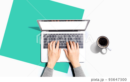 Person using a laptop computerの写真素材 [93647300] - PIXTA