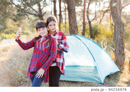 Lets go camping. Family camping. Reach...の写真素材 [94256976] - PIXTA