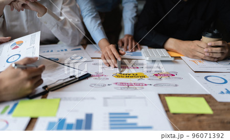 Group of Businesswoman and Accountant checking data document for ...