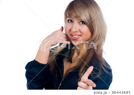 Pretty woman with Call me gestureの写真素材 [96443685] - PIXTA