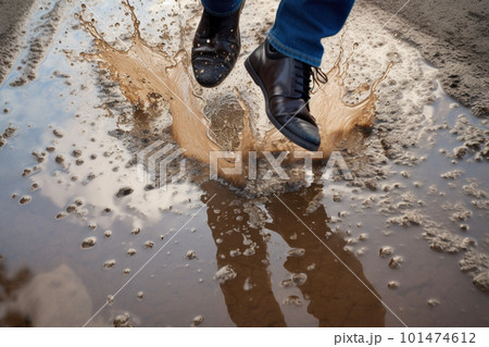 Man jumping in a puddle, splashes of dirty...のイラスト素材 [101474612] - PIXTA