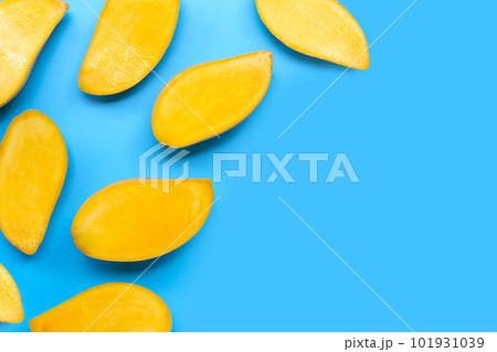 Tropical fruit, Mango on blue background.の写真素材 [101931039] - PIXTA