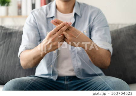 Happy young deaf man using sign Language to...の写真素材 [103704622] - PIXTA