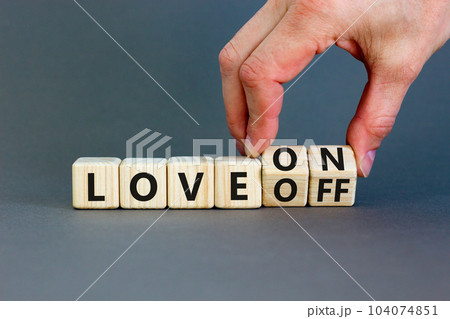 Love on or off symbol. Businessman turns wooden...の写真素材 [104074851] - PIXTA