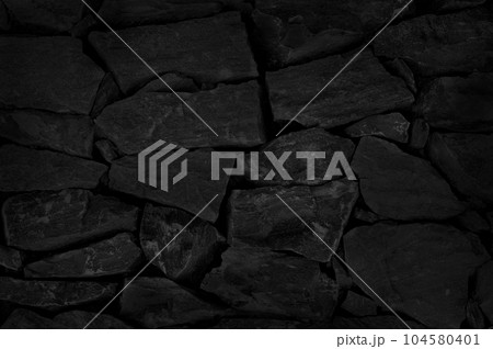 Old dark black stone brick wall texture with...の写真素材 [104580401] - PIXTA