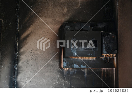 switchboard electricty burn on brick wall...の写真素材 [105622882] - PIXTA