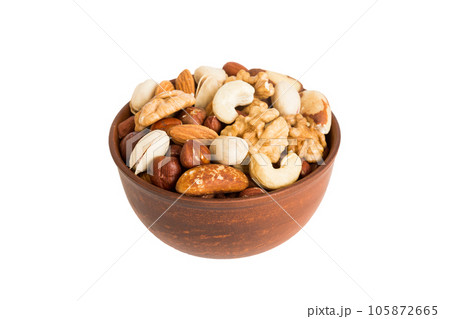 Roasted mix nut in bowl isolated on white...の写真素材 [105872665] - PIXTA