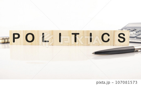 POLITICS assembled from wooden cubes next to a...の写真素材 [107081573] - PIXTA