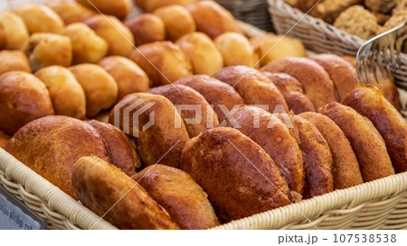 Many freshly baked buns in the basket. Top view...の写真素材 [107538538] - PIXTA