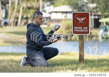 Operator is preparing to fly his quadcopter in...の写真素材 [108129076] - PIXTA