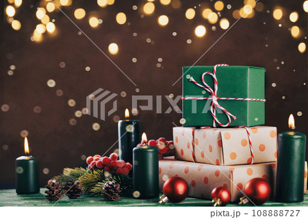 Christmas gift boxes with decoration on the tableの写真素材 [108888727] - PIXTA