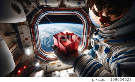 Astronaut Holding Red Gift Box in Space Stationのイラスト素材 [109054628] - PIXTA
