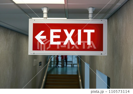 The Exit sign glowing in red shows the word...のイラスト素材 [110573114] - PIXTA